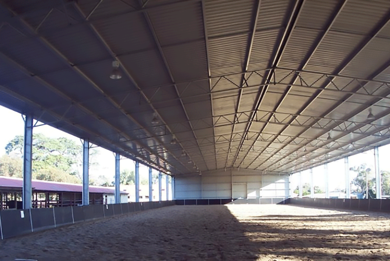 24m (W) x 70m (L) horse arena with enclosed end walls - Action Steel