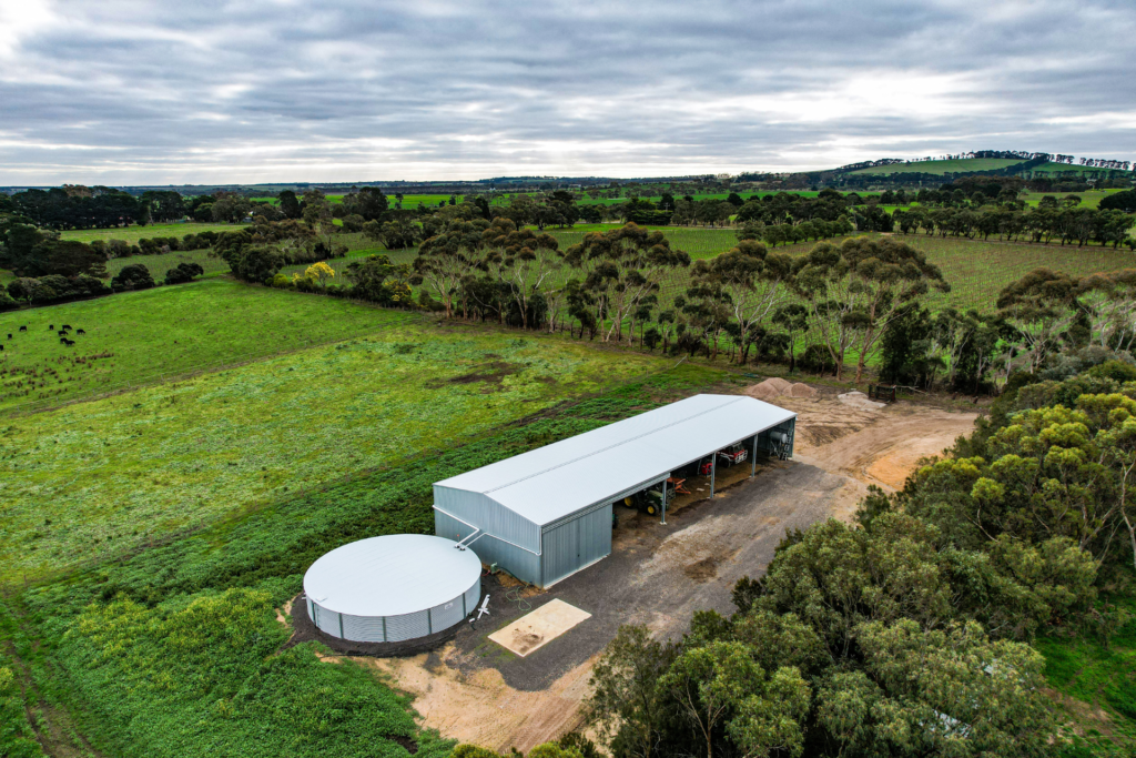 40m x 12m x 5m machinery shed with an enclosed bay - Action Steel