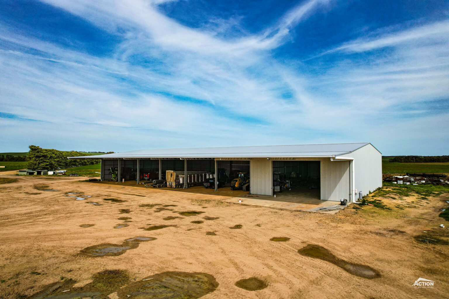 64m x 27m x 7m machinery shed with 9 metre canopy - Action Steel